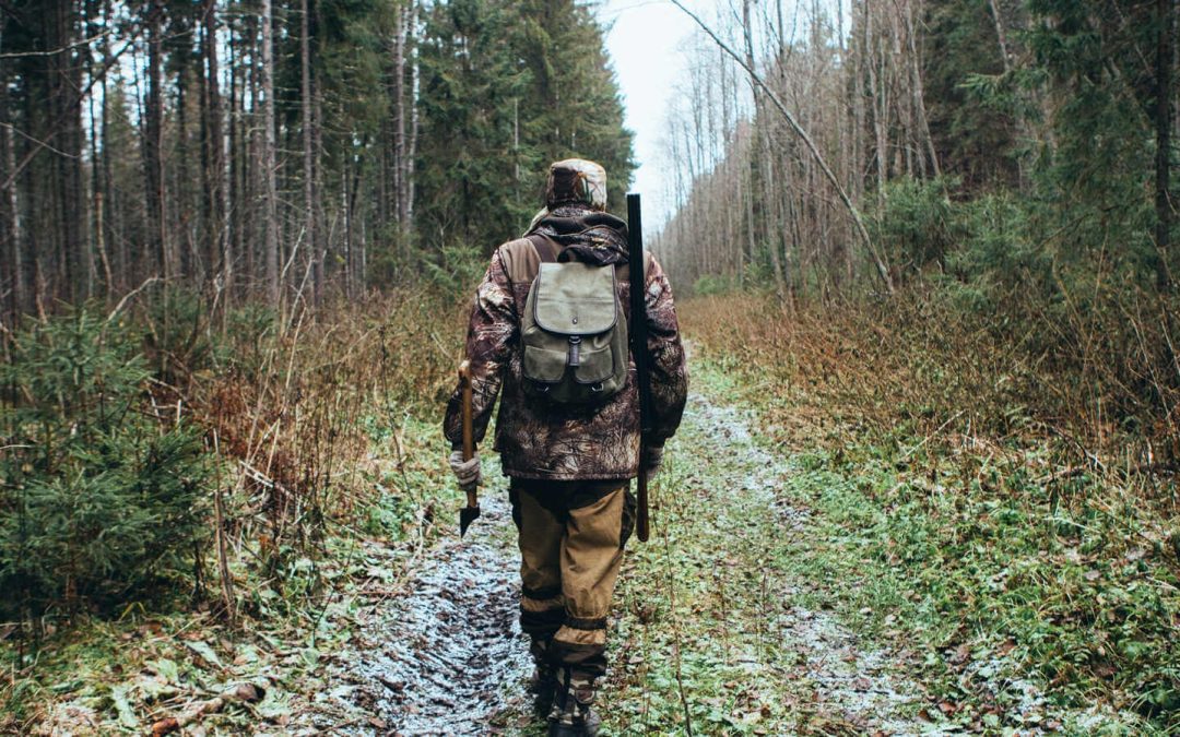 Male hunter, forest | Redding Reloading Equipment